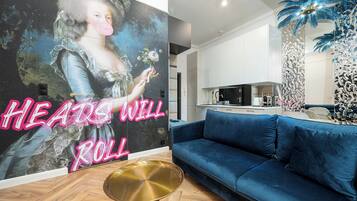 Apartamento Deluxe, 1 quarto | Sala