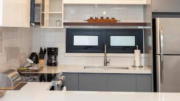 Apartamento, pátio | Cozinha privada