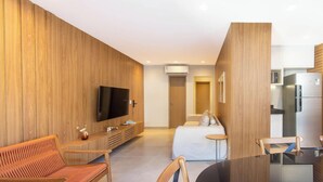 Apartamento Básico | Sala de estar | Televisor de 40 polegadas com canais digitais 