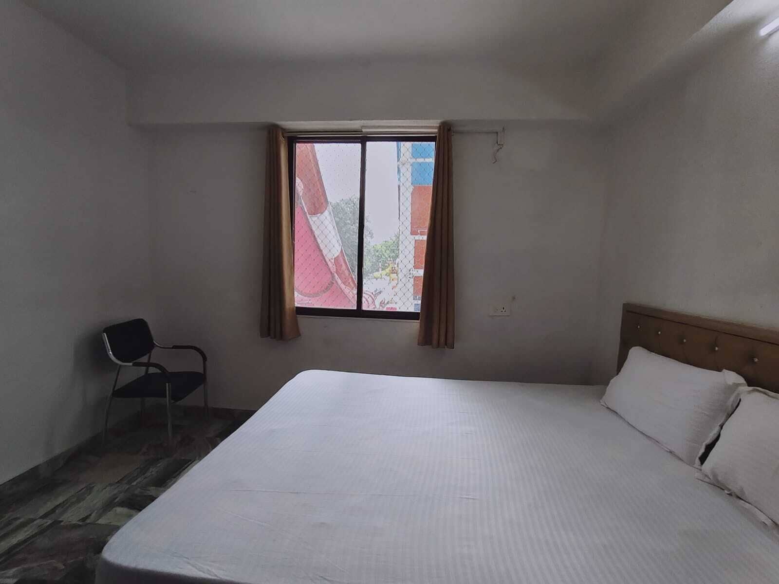 Quarto Duplo ou Twin Standard, vista para o pátio