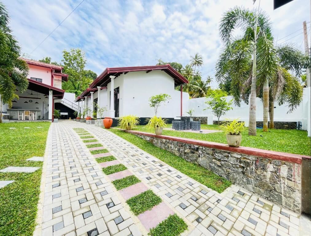 Vila standard, vista para o jardim | Área da propriedade