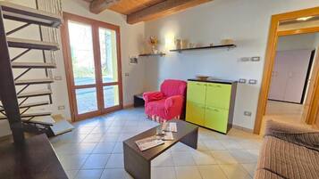Apartamento, vista para a montanha | Área de estar