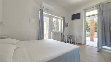 Quarto Familiar, vista para o pátio | Roupa de cama fornecida