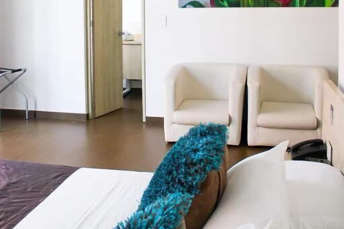 Suite Deluxe, Vista para a cidade | Cofre no quarto, quartos insonorizados, Wi-fi grátis