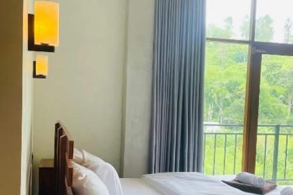 Quarto Quádruplo Deluxe, varanda, vista para a montanha