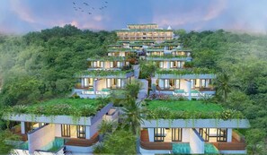 Um hotel com vários andares e design em terraços, com muita vegetação e uma escadaria central.