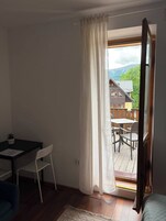 Quarto casal conforto, vista para a montanha | Parte interna