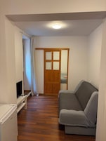 Quarto quádruplo conforto | Área de estar