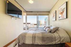 Apartamento, Vista para a cidade | Ferro/tábua de engomar, Wi-fi grátis, roupa de cama fornecida 