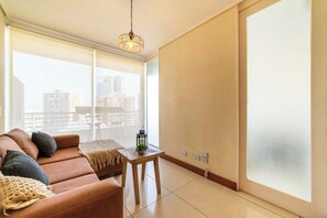 Apartamento, Vista para a cidade | Sala de estar