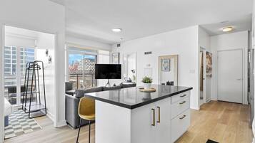 Apartamento Deluxe | Sala de estar