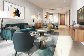 Uma sala de estar moderna com sofá, cadeiras, mesa de centro e um espaço de refeições com mesa e cadeiras.