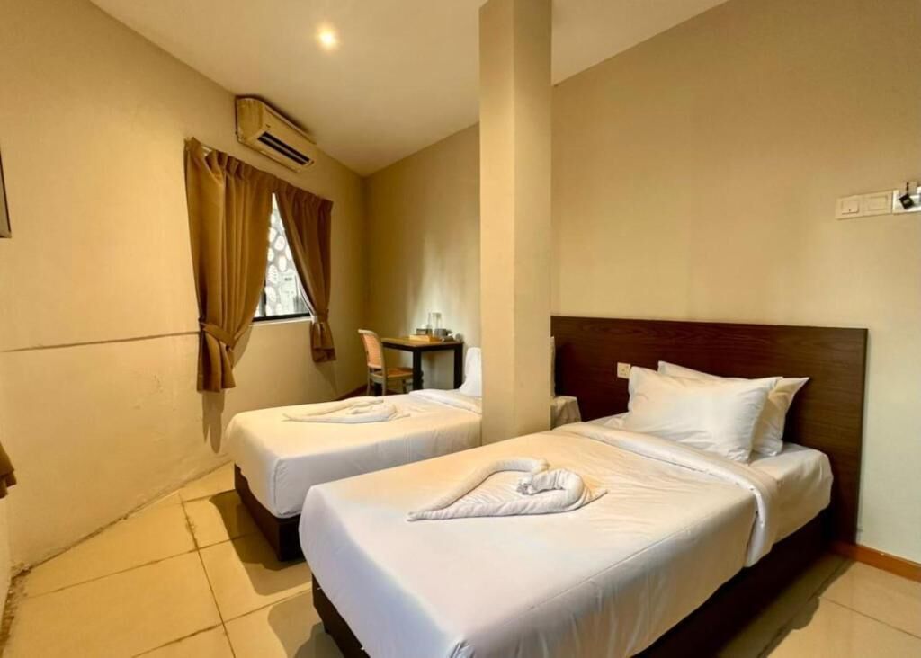 Quarto Twin Deluxe | Ferro/tábua de engomar, Wi-fi grátis 