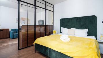 Apartamento conforto | Frigobar, espaço de trabalho para notebook