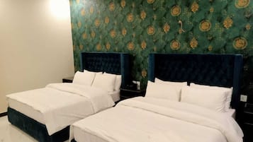 Quarto Quádruplo Deluxe | Cortinas/cortinados opacos, Wi-fi grátis