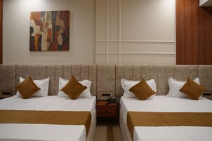 Quarto família | Camas extras/dobráveis (sobretaxa), Wi-Fi de cortesia, roupa de cama