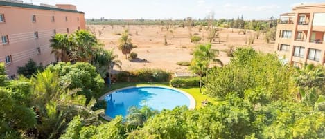 Apartamento, varanda, Vista para a cidade | Piscina