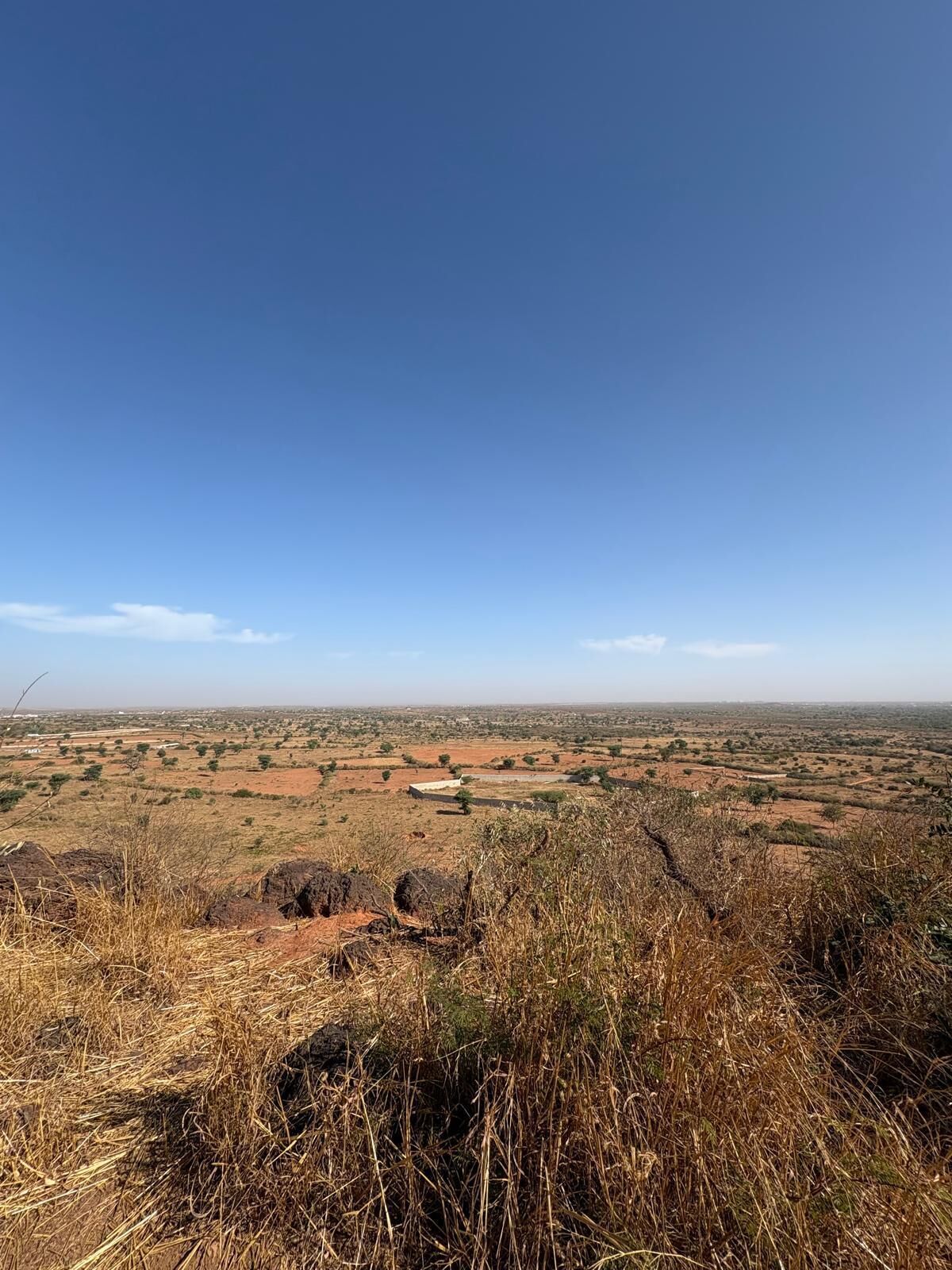 A vast, open landscape with a clear sky.