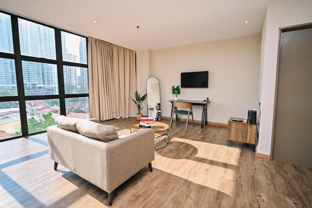 Quarto Quádruplo Deluxe | Sala de estar
