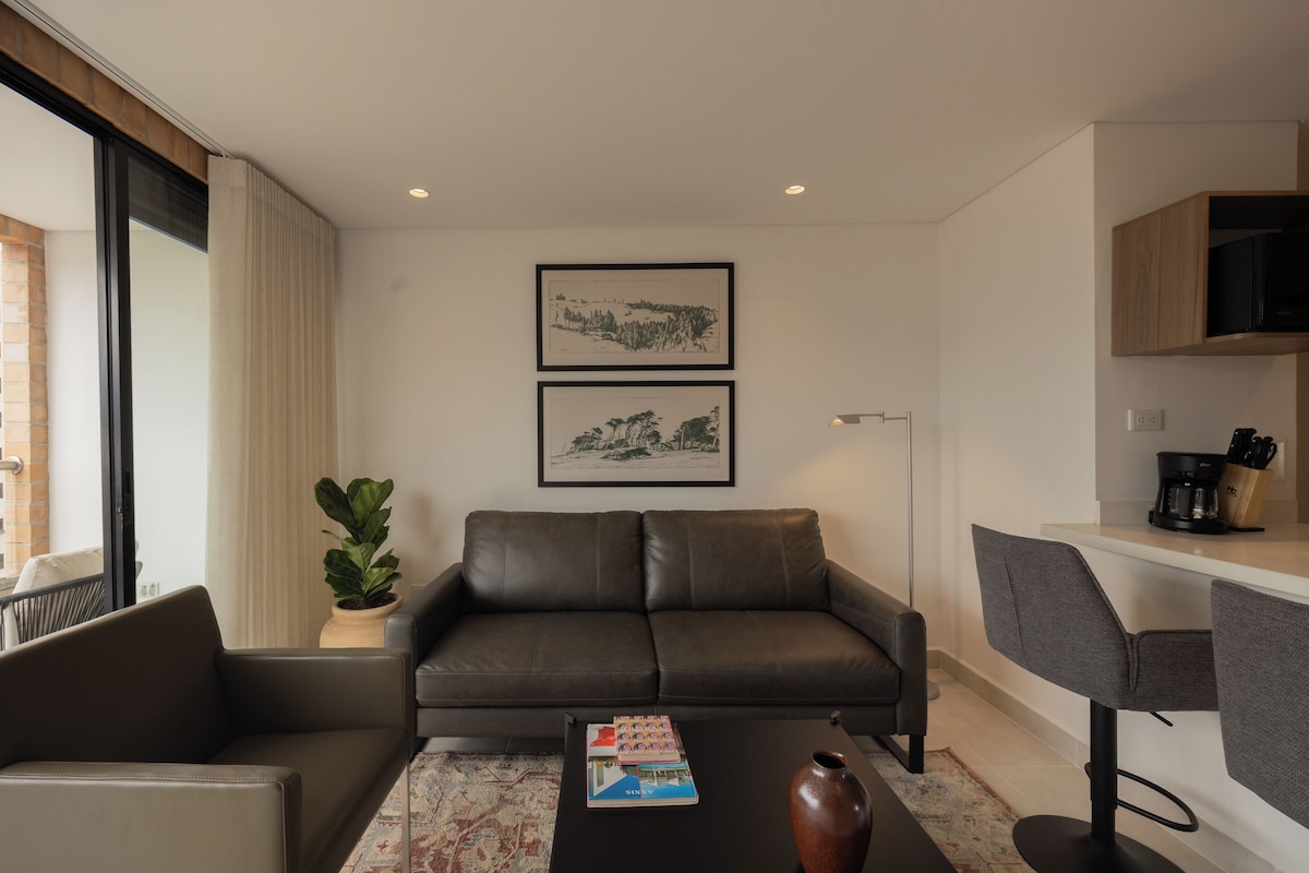 Apartamento família | Área de estar | TV LCD 32 polegadas com canais a cabo