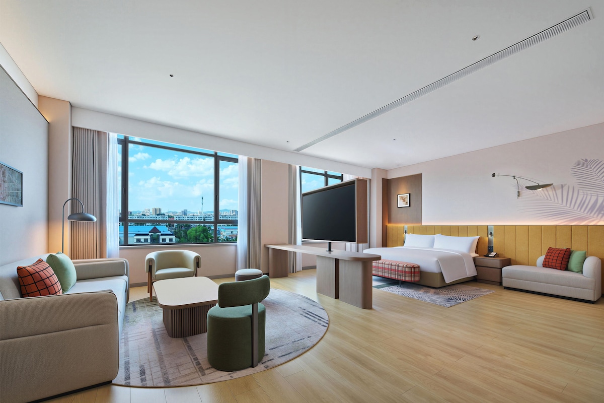 Quarto Premium, 1 cama king-size e sofá-cama | Sala de estar