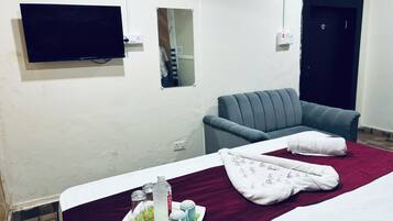 Quarto luxo | Camas extras/dobráveis (sobretaxa), roupa de cama