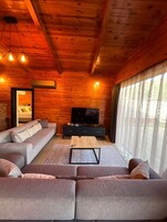 Bungalow de Luxo, piscina privativa, vista para a piscina | Sala de estar