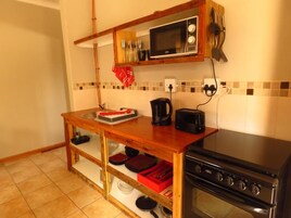 Apartamento, pátio, vista para o pátio | Cozinha privada