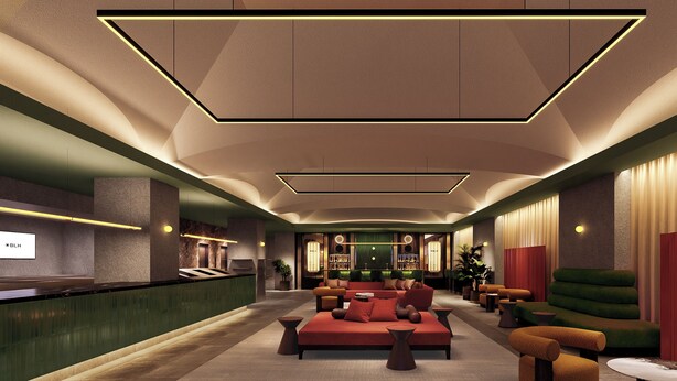 Um hall moderno com balcão de recepção, área de estar e bar.