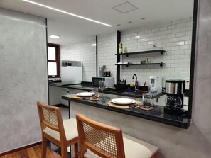 Loft, vista para a cidade | Cozinha privada