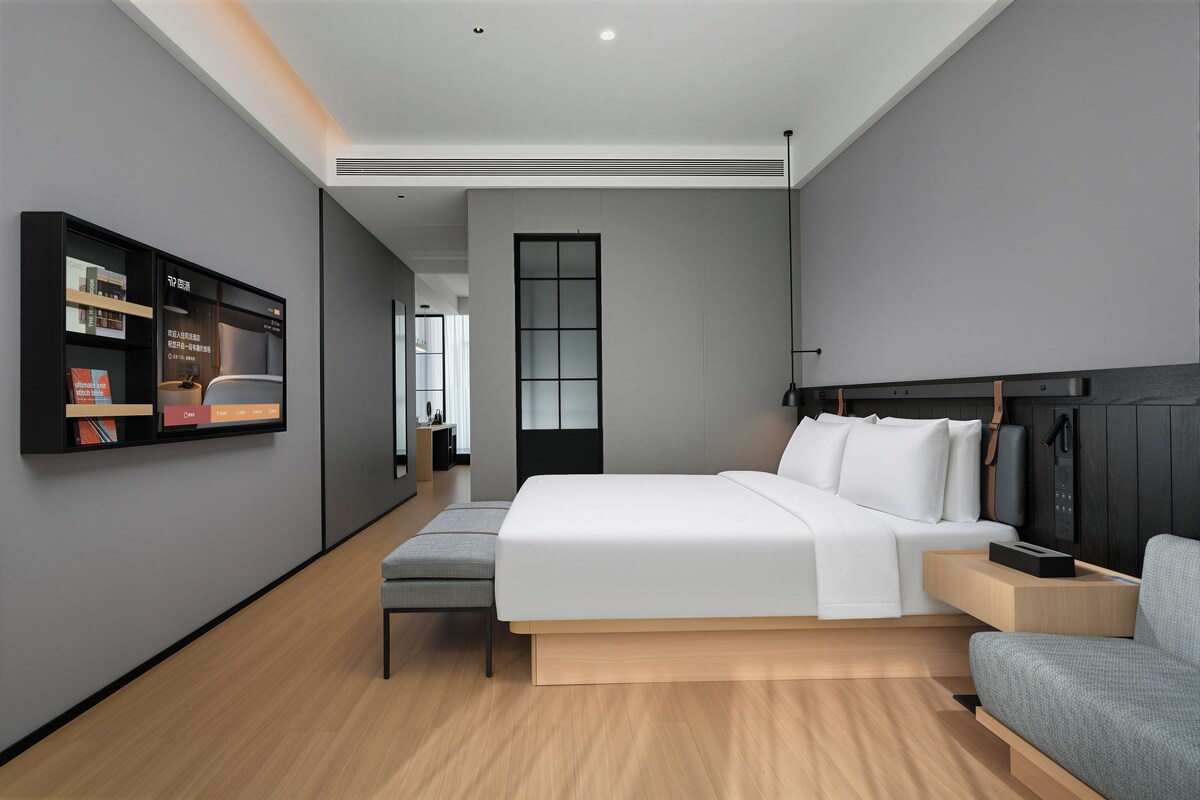 Quarto Individual Deluxe, Vista para a cidade | Roupa de alta qualidade, camas de colchão viscoelástico, minibar 