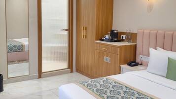 Quarto Premium | Minibar, Wi-fi grátis, roupa de cama fornecida