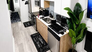 Apartamento, vista para a cidade | Cozinha privada