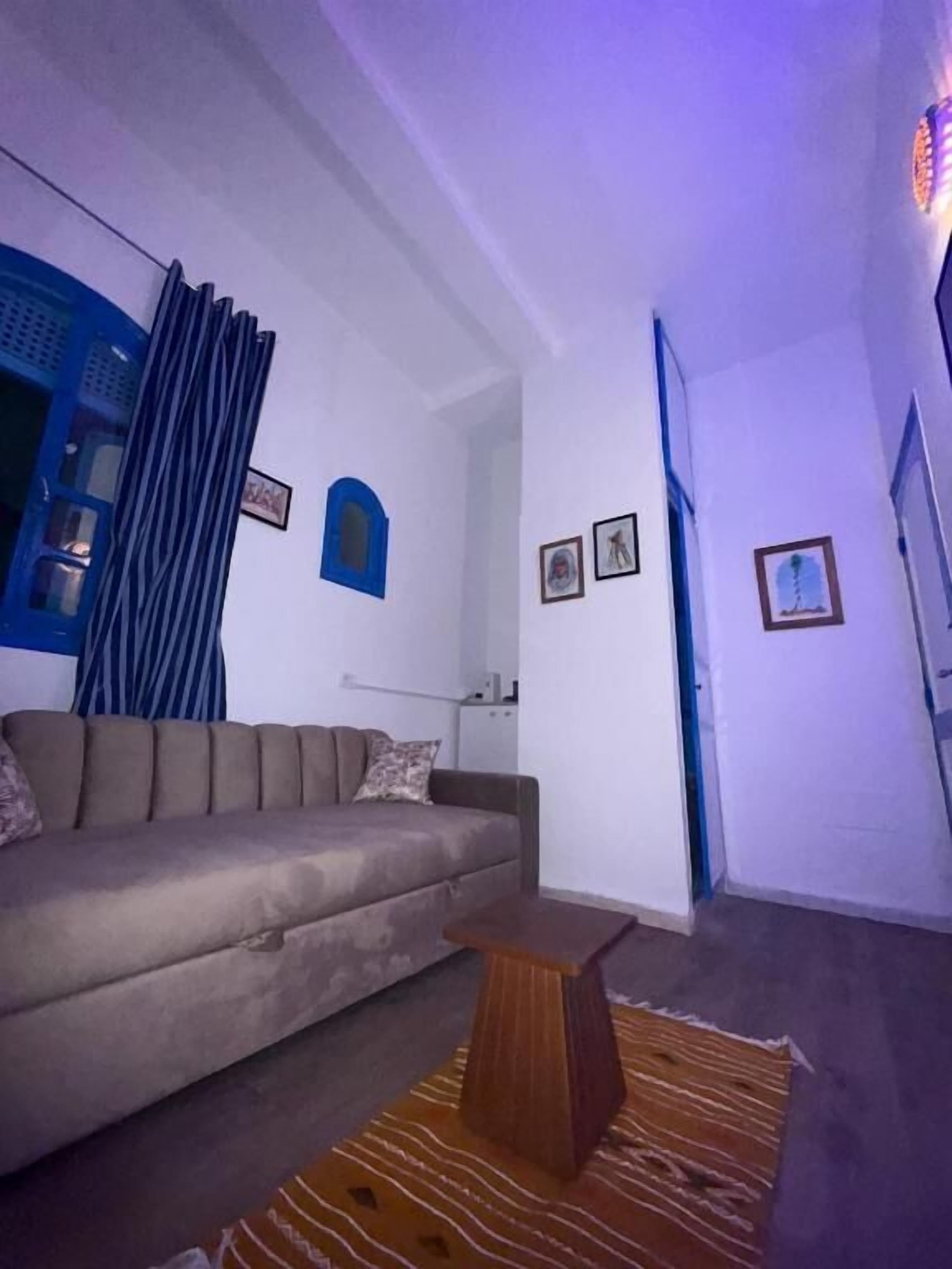 Suíte luxo, vista para o pátio | Área de estar