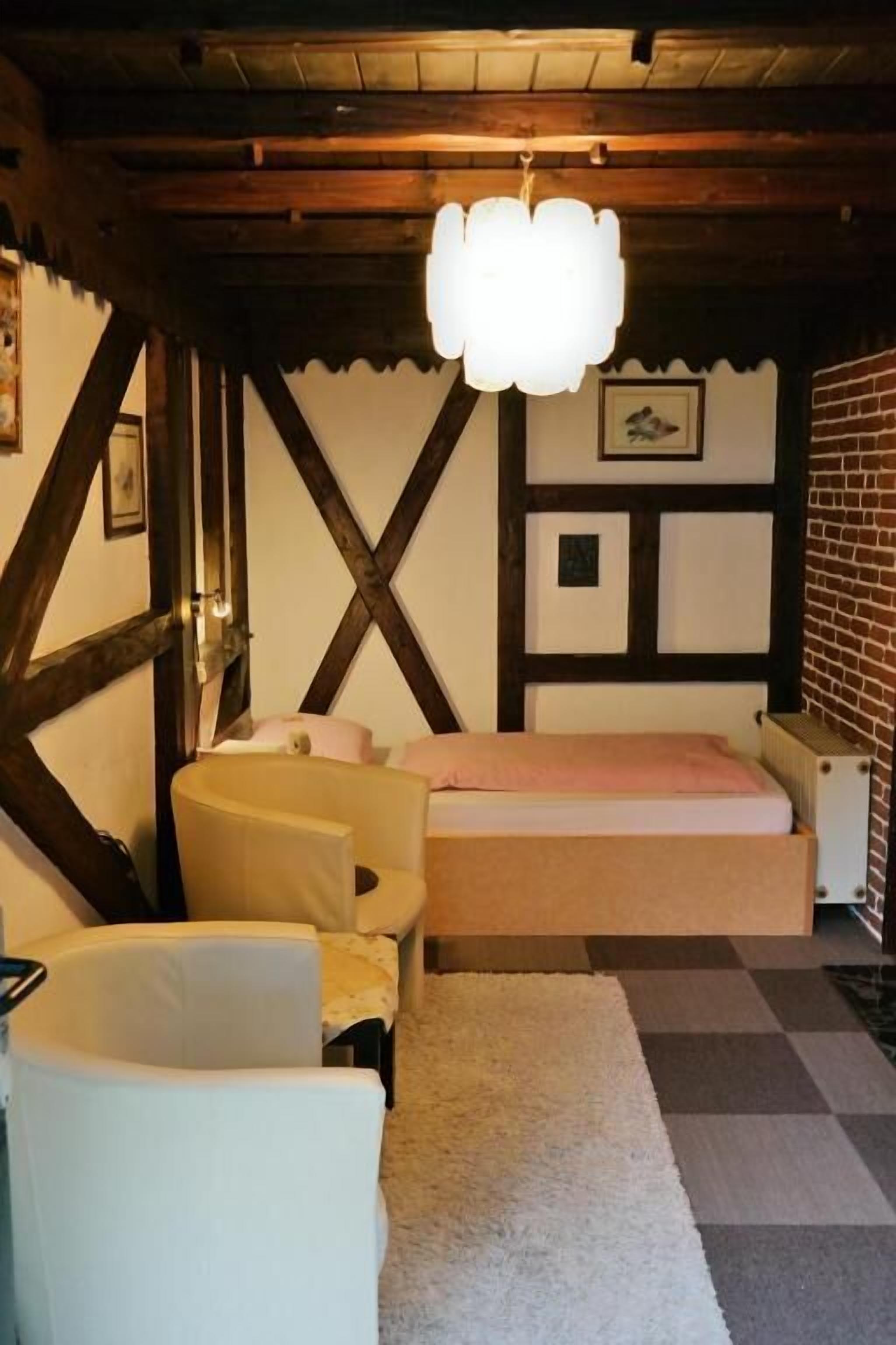 Quarto triplo clássico, vista para o jardim