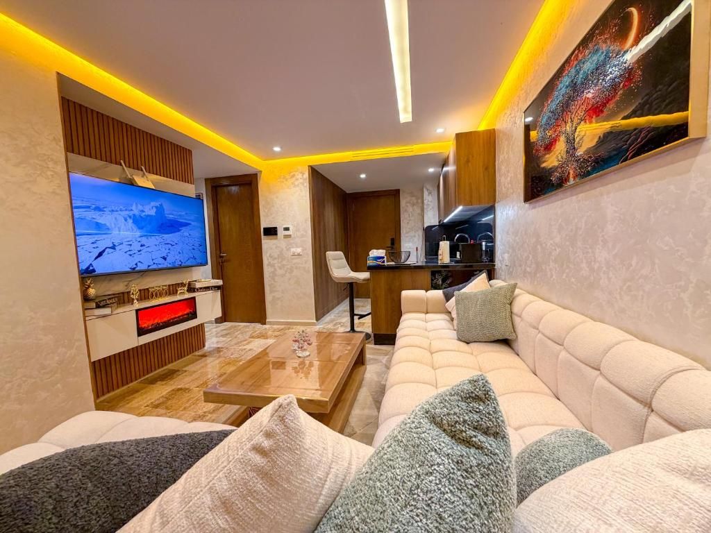 Cobertura panorâmica, 2 quartos, vista para o mar | Área de estar