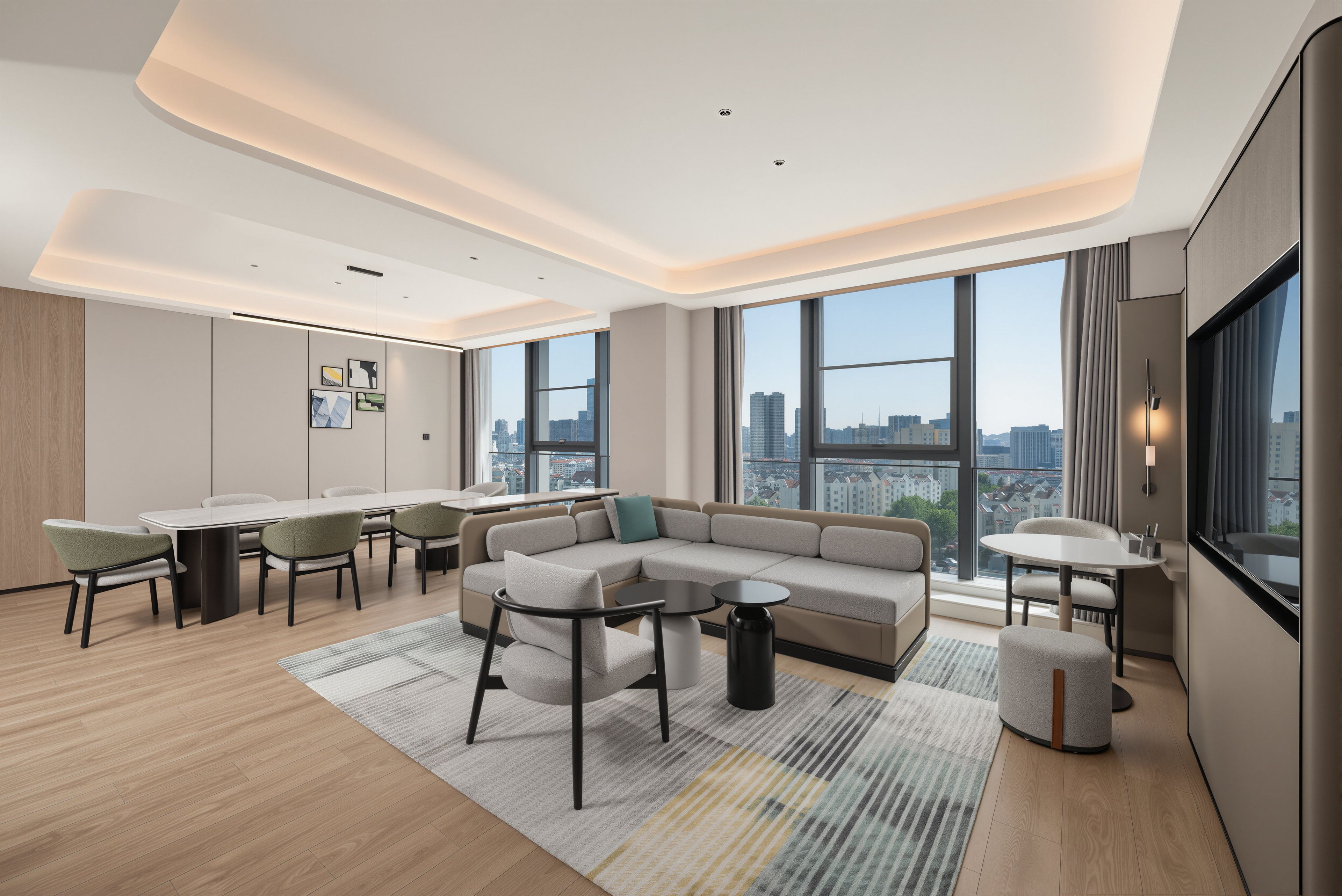 Uma sala de estar moderna com sofá, mesa de centro e área de jantar.