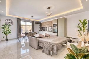 Apartamento, varanda, Vista para a cidade | Cortinas/cortinados opacos, ferro/tábua de engomar, Wi-fi grátis 