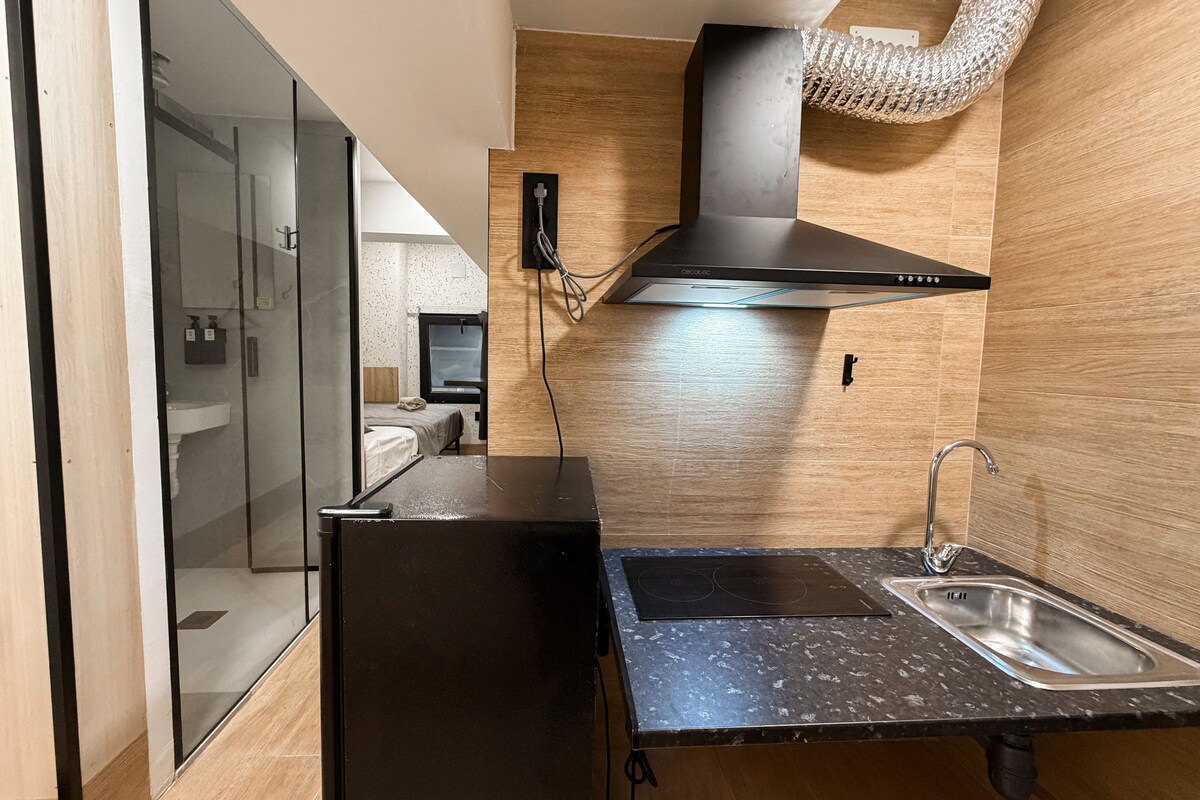 Quarto Individual Comfort, 1 cama individual, cozinha | Cozinha privada | Um frigorífico no espaço comum, um micro-ondas no espaço comum 