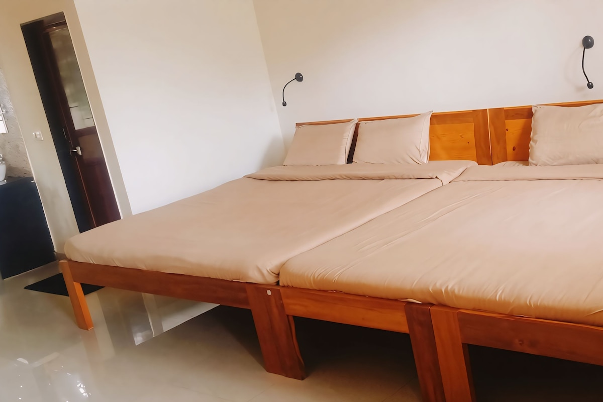 Quarto Quádruplo, vista para o jardim | Wi-fi grátis 
