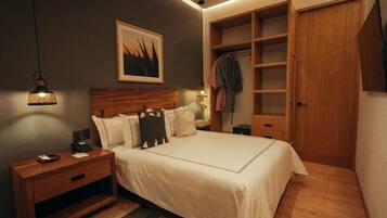 Quarto com cama, mesa de cabeceira, luminária e guarda-roupa.