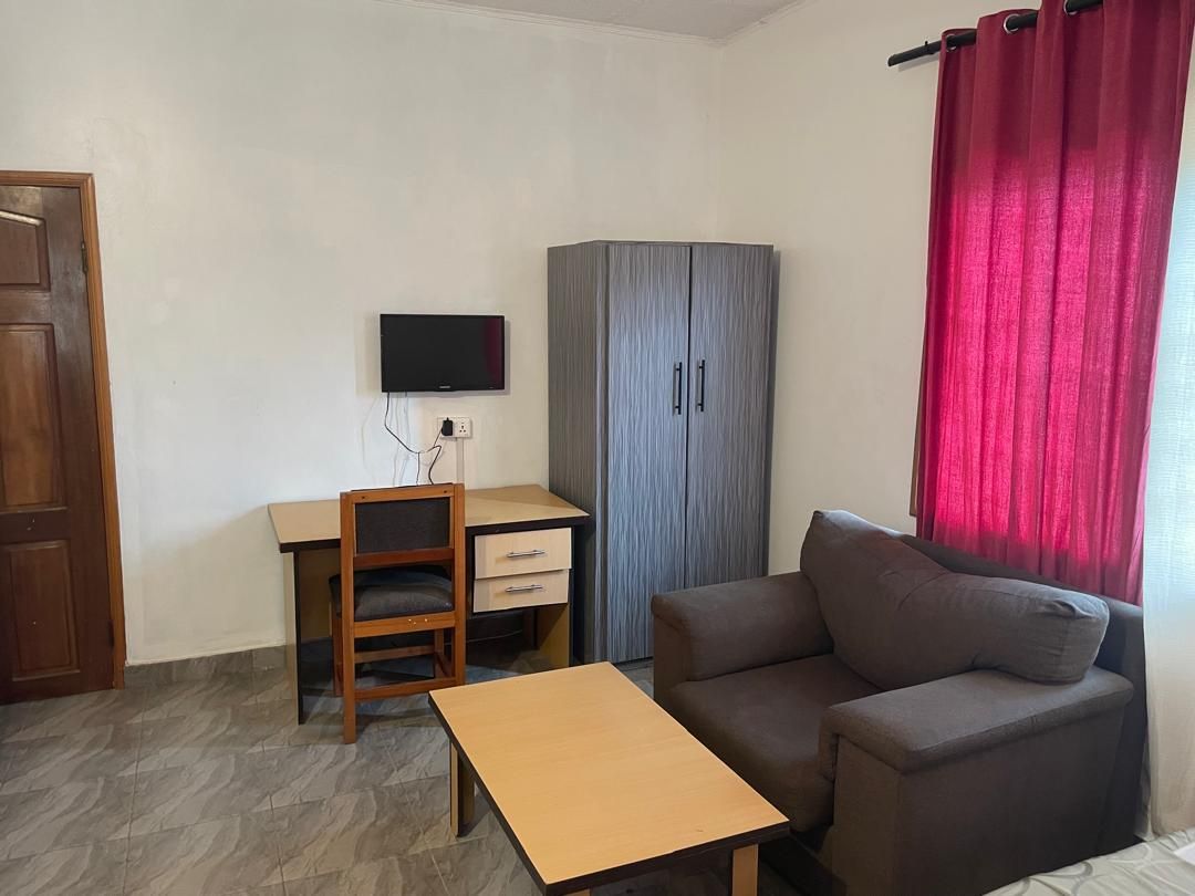Quarto Duplo Deluxe | Sala de estar