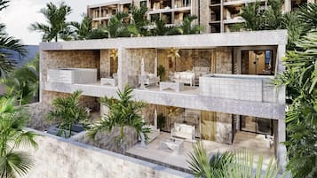 Um hotel com vários andares, varandas, área de estar externa e vegetação exuberante.