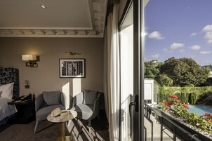 Superior Double room with pool & garden view | Vista para o jardim