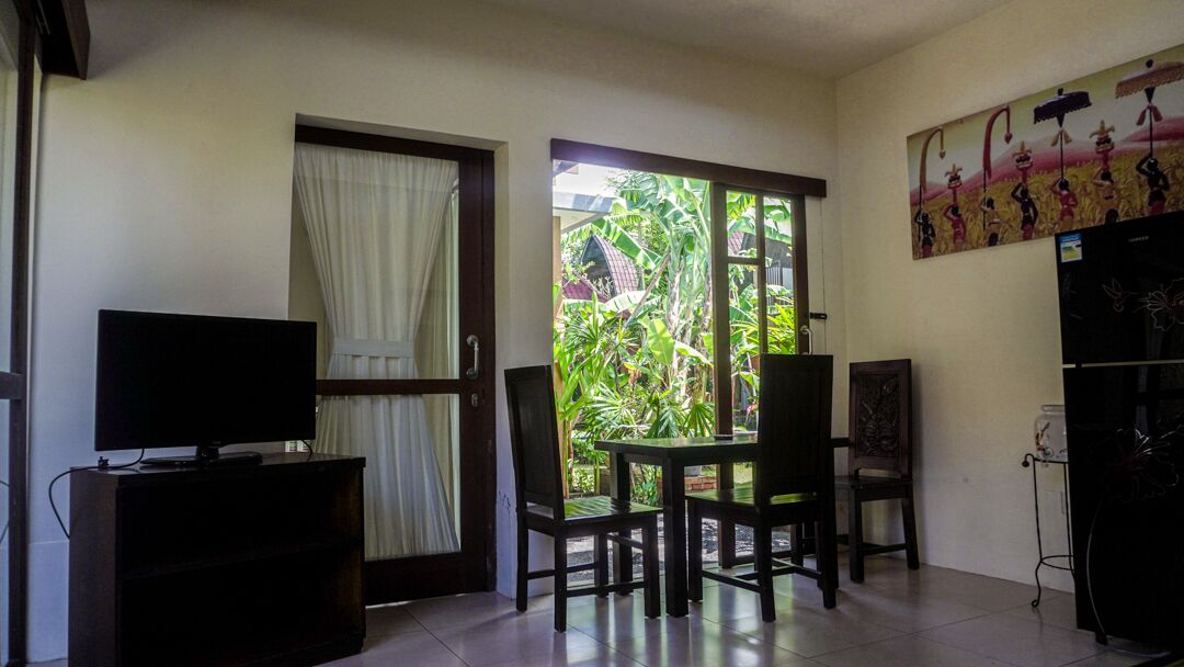 Apartamento, 2 quartos | Sala de estar | Televisor LED de 43 polegadas com canais por cabo, televisor 