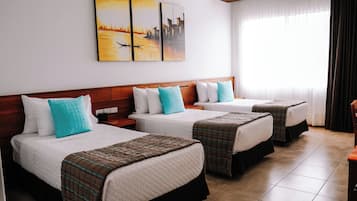 Quarto standard | Roupas de cama premium, edredons de pluma, frigobar, cofres nos quartos