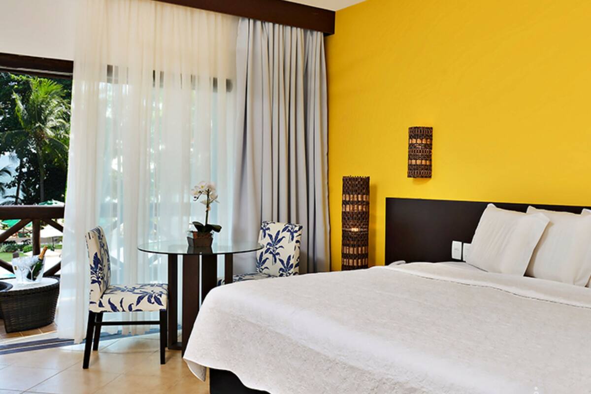 Suite Executiva, vista para o mar | Roupa de alta qualidade, minibar, cofre com capacidade para portátil 