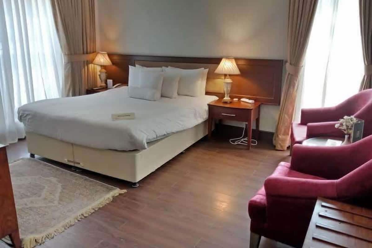 Quarto Club | Roupa de alta qualidade, camas de colchão pillowtop, minibar