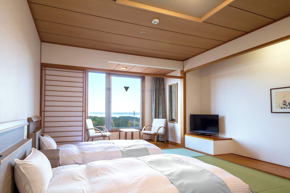 Quarto família, para não fumantes | Edredons de pluma, cofres nos quartos, cortinas blackout