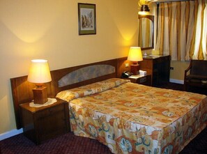 Quarto standard, vista para a cidade | Frigobar, berços grátis, camas extras/dobráveis (sobretaxa)